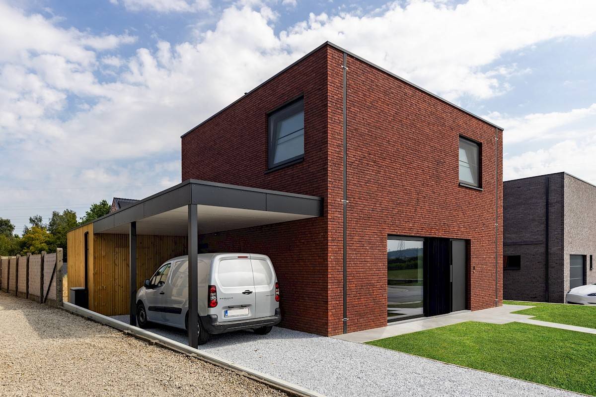 Aangebouwde carport met berging - Ostyn